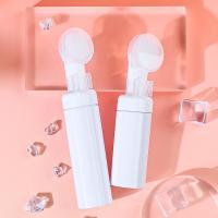China 100ml Foam Pump Bottle with Silicone Brush for Refillable Facial Cleanser Packaging for sale