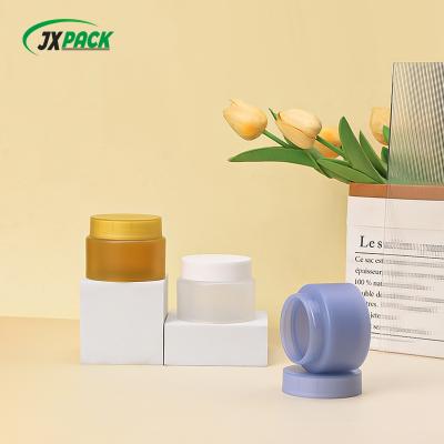 China 50g 100g Double Wall PP Cream Jar with Leak-Proof Screw Cap for Premium Skincare Packaging for sale