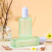 China Luxury PETG Serum Bottle with Thick Wall Design and Flat Square Structure for Leak-Proof Cosmetic Packaging for sale