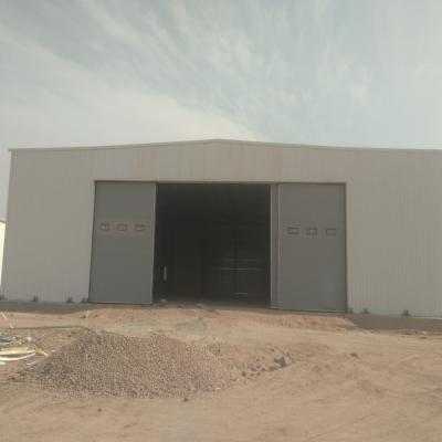 China Customizable Steel Workshop with Insulated Fiberglass Wool Solutions for sale