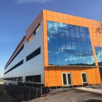 China Premium Steel Structure Workshop Featuring Insulated Fiberglass Roof for sale