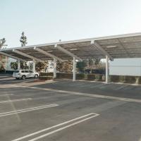 China Modern Prefab Steel Parking Shed with Long Span Design for sale