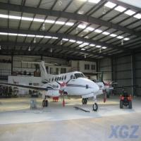 China Premium Steel Hangar Featuring Durable Eaves Gutter and Windows for sale