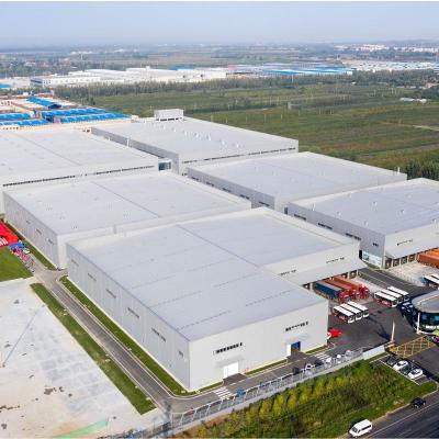 China Heavy-Duty Steel Prefabricated Warehouse with Built-in Lift System for sale