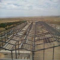 China Premium Q355 Steel Warehouse with Insulated Fiberglass Roof for sale