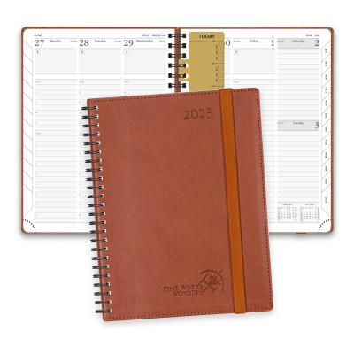 China Brown Softcover Spiral Planner 2023 6.5x8.5in Daily Weekly Schedule Custom Paper Pocket for sale