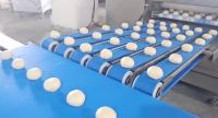 China Standardized Pizza Dough Rounder Machine 3000 Pieces/Hour 1.5kw Dough Separator for sale