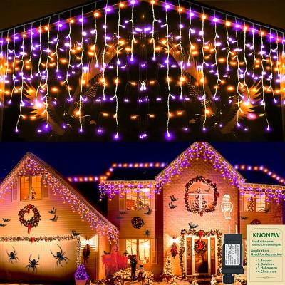 China Connectable Waterproof Outdoor Icicle Lights 900 LED Warm White Twinkle Lights for sale