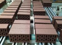 China EV Series Interlocking Clay Brick Making Machine with Dryer Chamber - 11000-16000 pcs/h Capacity, 6750x1880x2540mm Dimensions for sale