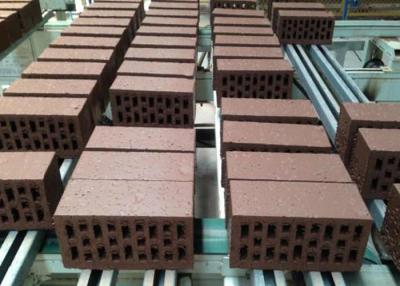 China EV Series Interlocking Clay Brick Making Machine with Dryer Chamber - 11000-16000 pcs/h Capacity, 6750x1880x2540mm Dimensions for sale