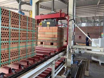 China Clay production line automatic unloading systems for fired bricks and packaging systems after unoading by robots for sale
