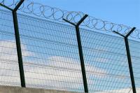 China High Security Concertina Razor Wire On The Top Of Airport Perimeter Security Fencing for sale