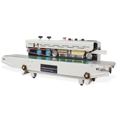 China Automatic Canning and Sealing Process Machine for Plastic Packaging of Small Fruit Food for sale