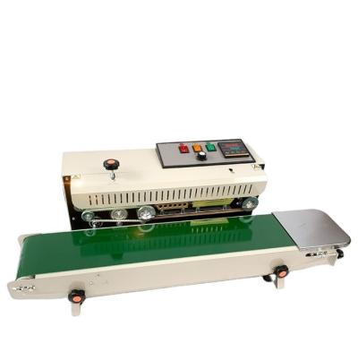 China Film Packaging Band Sealer with Horizontal Solid Ink Coding Sealing Speed 0-12m/min for sale