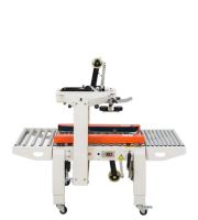 China 6-12 mm Sealing Width Automatic Top And Bottom Drive Belt Adhesive Tape Sealer Case Box Carton Sealing Machine for sale