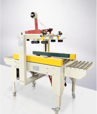 China 106 KG FXC-4030 Automatic Food Boxes Packing Carton Sealer Sealing Machine for sale