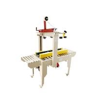 China 106 KG FXC-4030 Automatic Food Boxes Packing Carton Sealer Sealing Machine for sale
