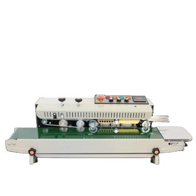 China Horizontal Continuous Band Sealing Machine with Iron Gear and 0-300C Temperature Range for sale