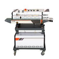 China LF1080 Continuous Air Suction Gas Flushing Band Sealer Vacuum Inflating Bag Sealing Machine for sale