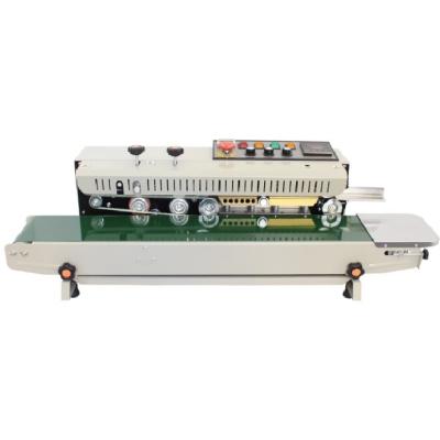 China Temperature Control 0-300Degree Horizontal Plastic Film Bags Heat Sealing Machine 770W for sale