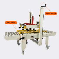 China Construction Works Auto Box Taping Carton Sealing Machine with Packaging Material for sale