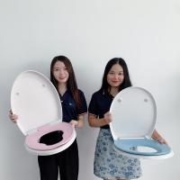 China Urea Slow Close Toilet Seat with Child Seat Magnetic 445mm Oval 2.05kg for sale