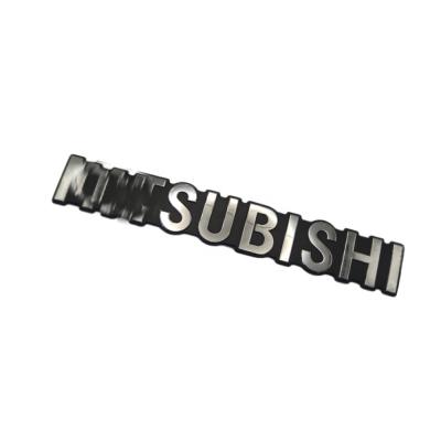 China XLX High Quality New Original Factory Mitsubishi Montero Pajero Tailgate Logo Body Kit MB292414 Auto Spare Part 3 Months for sale