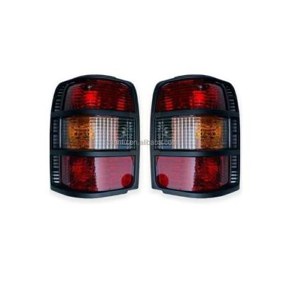China Mitsubishi Pajero Auto Parts 8330A571 New LED Rear Tail Lamp Light Combination Halogen Stop Turn Brake Lamp Shade Bulb Assy for sale