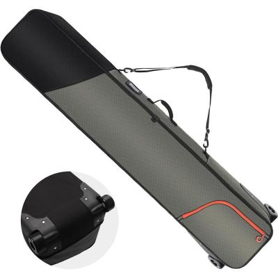 China Mens Beginner Ski Travel Bag Lightweight 1680D Oxford Fabric Waterproof Snowboard Bag with Foil Lining Zipper Wheels Roller for sale