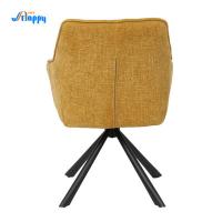 China Elegant Yellow Rotating Dining Chair with Fabric Cover and Iron Frame Modern Style for sale