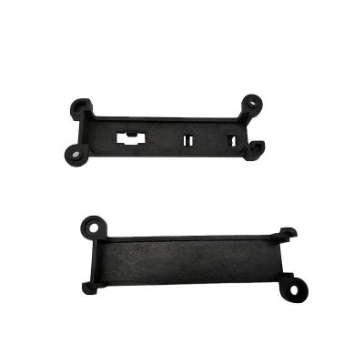China Custom Injection Molded PC Automotive Bumper Flashlight Housing Parts 100k-500k Shots for sale
