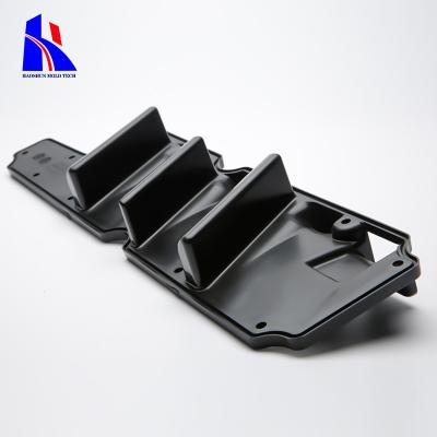 China High Glossy Injection Molded Plastic Parts In PC ABS Blend Material Black for sale