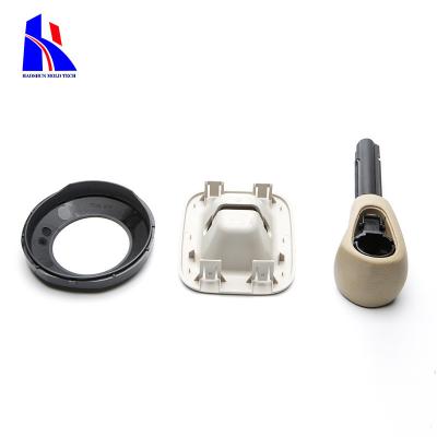 China Custom TPE Plastic Injection Molding Automotive Interior Door Handle 2 Shot Molds for sale