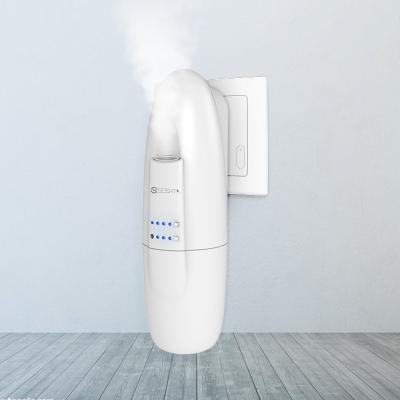 China Wireless Bluetooth Aroma Diffuser Home Fragrance Wall Plug In Diffuser for sale