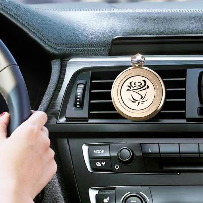 China Custom Logo Vent Clip Car Air Freshener Golden Waterless Car Perfume Diffuser for sale
