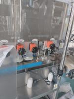 China QuickSeal Automatic Screw Capping Machine 180 Bottles/Min 50Hz Frequency for sale