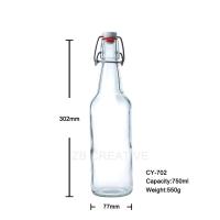 China Logo Embossing Beer Glass Bottle 750ml Swing Cap Packaging Container 550g CY-702 for sale