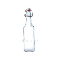 China Logo Embossing Beer Glass Bottle 750ml Swing Cap Packaging Container 550g CY-702 for sale