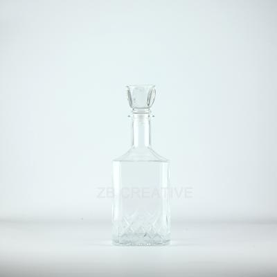 China 500ml Flint Glass Liquor Bottle with Engraved Design and Cork Finish for Premium Spirits for sale
