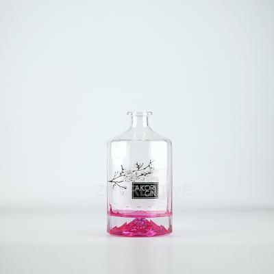 China 700ml Custom Decal Firing Clear Glass Liquor Bottle with Cork Top for Premium Spirits for sale