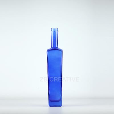 China 750ml Blue Spray Coated Glass Bottle with Cork Finish for Premium Spirits Packaging for sale