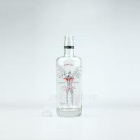 China 750ml Flint Glass Liquor Bottle with Cork Finish and Screen Printed Design for Premium Spirits for sale