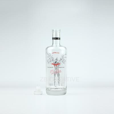 China 750ml Flint Glass Liquor Bottle with Cork Finish and Screen Printed Design for Premium Spirits for sale