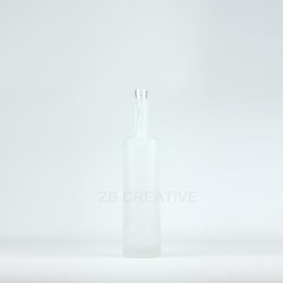 China 750ml Frosted Flint Glass Liquor Bottle with Cork Finish for Premium Spirits Packaging for sale