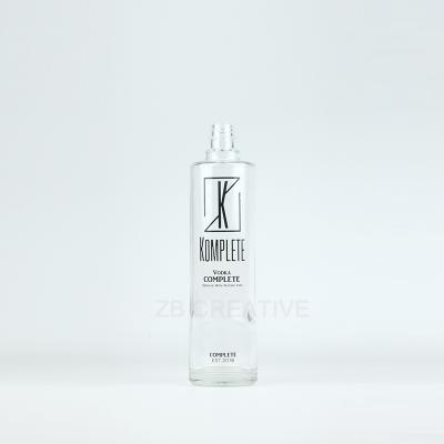 China 750ml Custom Printed Flint Glass Liquor Bottle with Screw Neck for Spirits Packaging for sale
