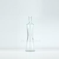 China 750ml Custom Engraved Flint Glass Bottle with Cork Finish for Premium Spirits for sale