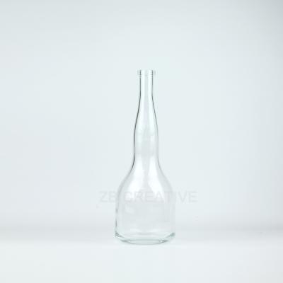 China 700ml Custom Glass Bottle Custom Shape Premium Liquor Glass Bottle with Cork Finish for Distilleries for sale
