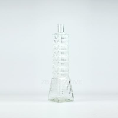 China 700ml Flint Custom Shape Luxury Glass Liquor Bottle with Cork Finish for sale