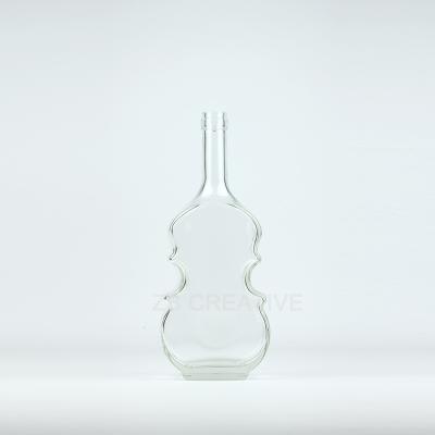 China 750ml Custom Glass Bottle Flint Custom Shape Liquor Glass Bottle with Cork Finish for Premium Spirits for sale