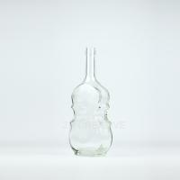 China Custom 750ml Flint Shape Liquor Glass Bottle Cork Finish Premium Spirits for sale